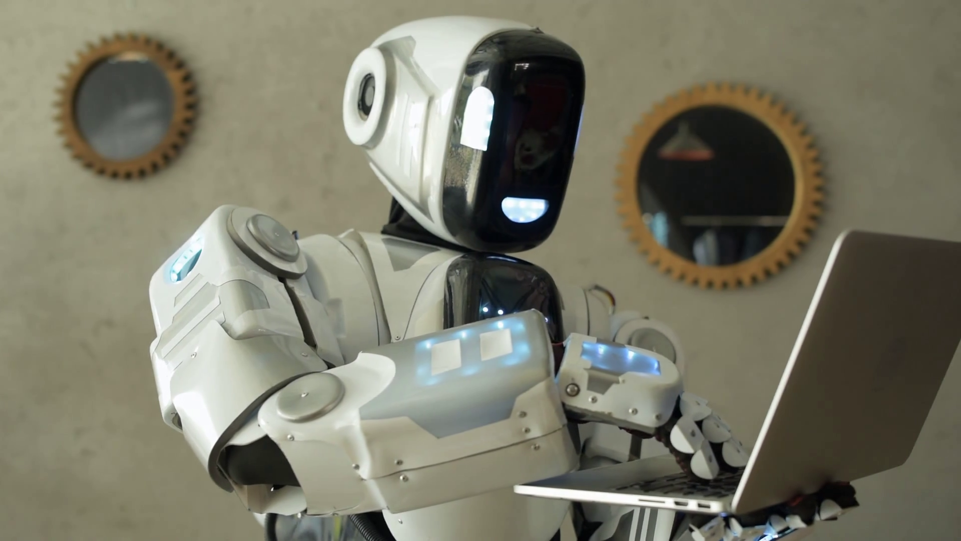 Impressive robot typing on laptop Stock Video Footage - Storyblocks