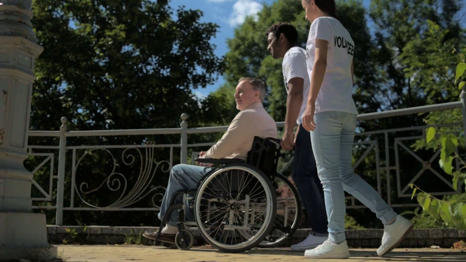 Young Volunteers Assisting Person In Stock Footage SBV-316694337 ...