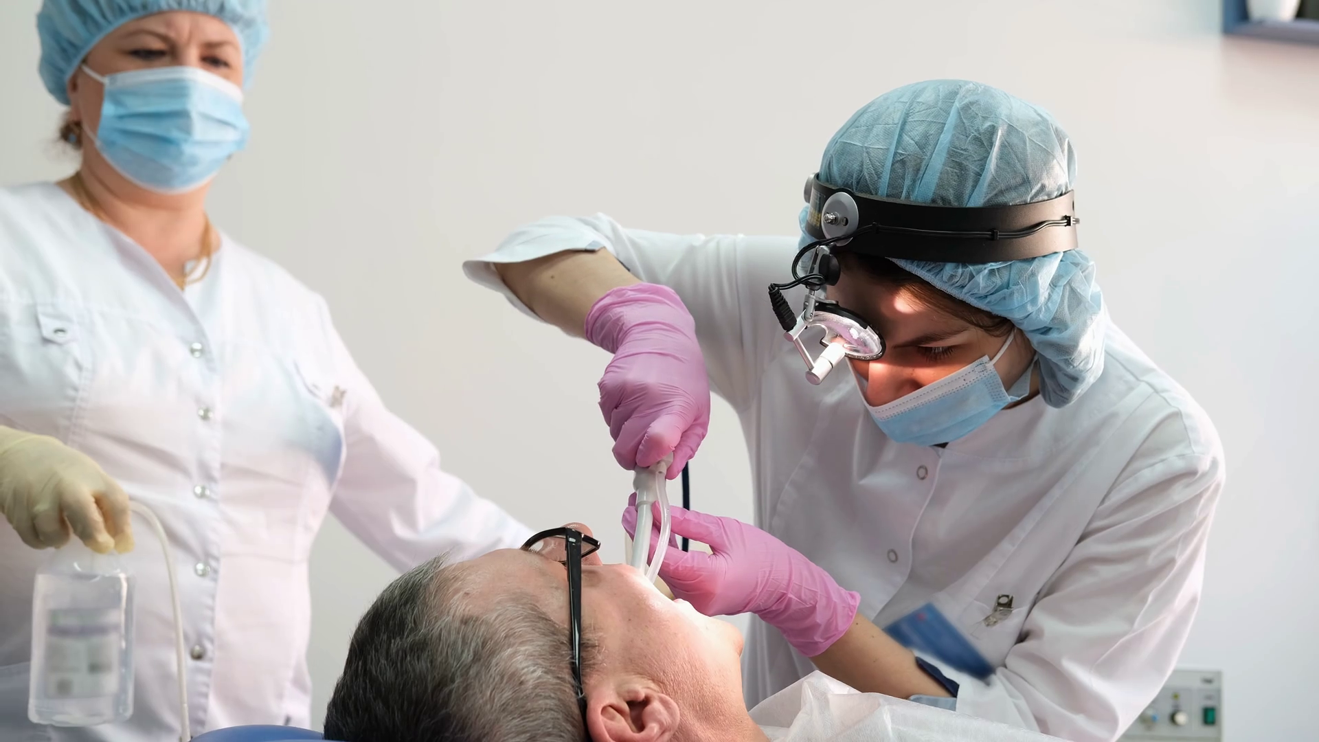 Otolaryngologists Wash Patient's Tonsils Stock Footage SBV-348459973 - Storyblocks