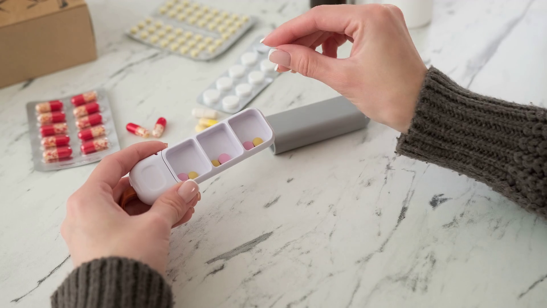 A Woman Sorts Tablets According To Schedule Stock Footage SBV-348594666 ...
