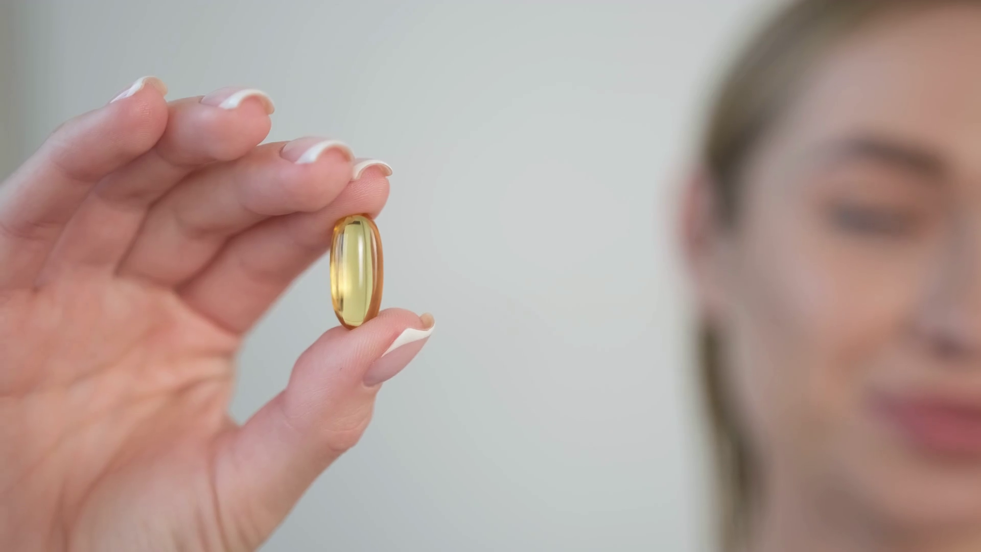 The Girl's Hand Holds Omega Tablet Close-up Stock Footage SBV-348594630 ...