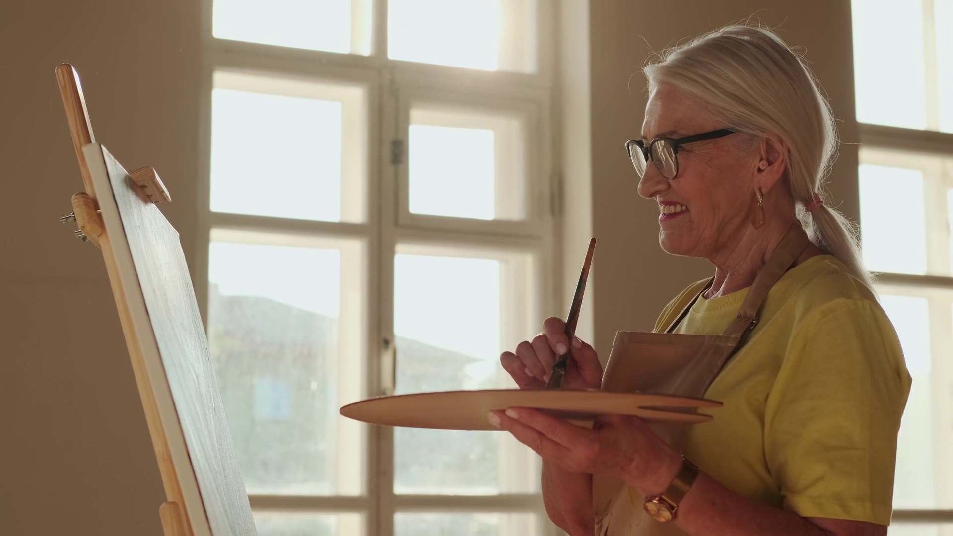 Senior Artist, Art Workshop, Sun Rays, Painting Woman. Happy senior ...