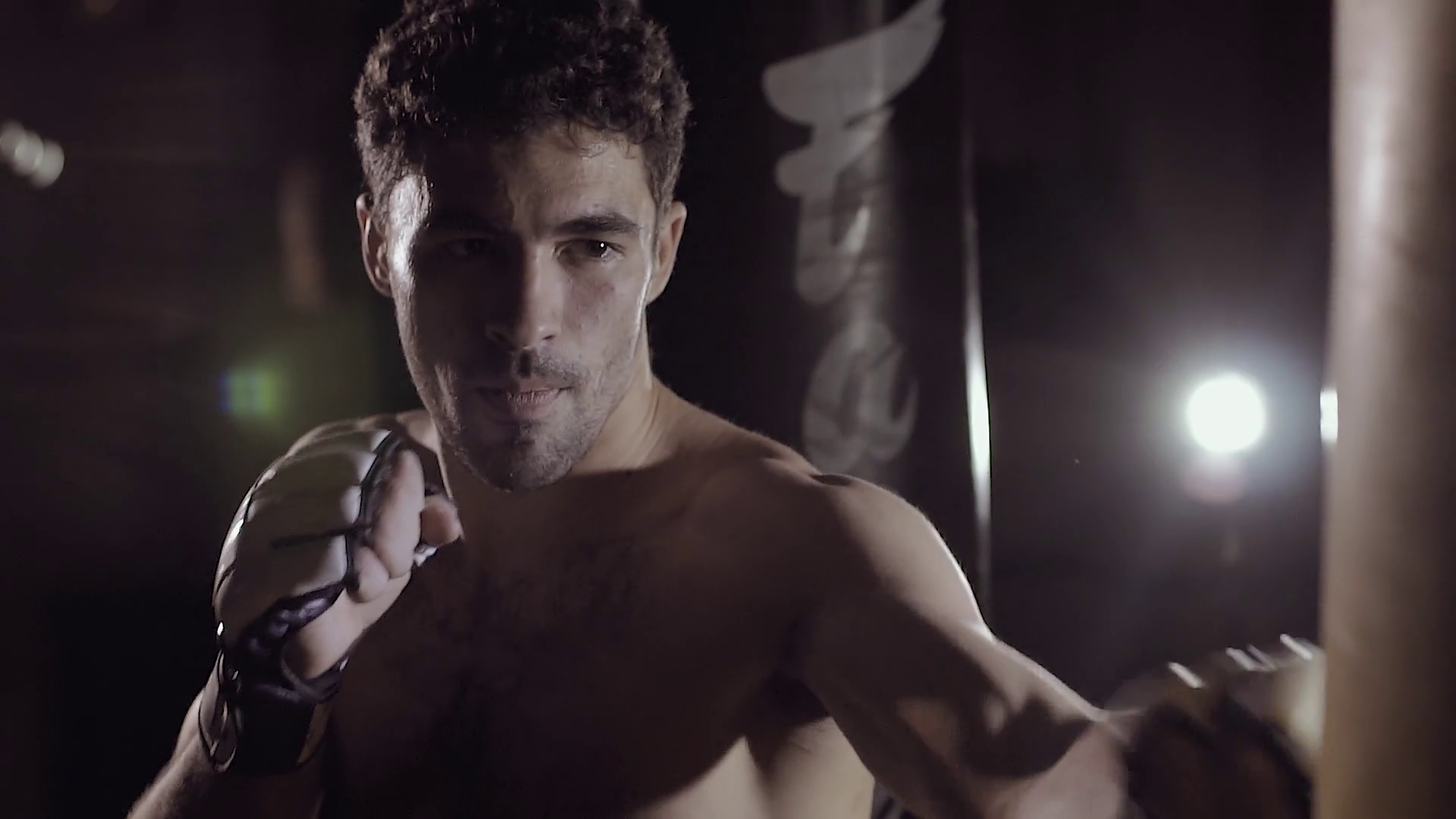 Strong Caucasian Man Beats Boxing Bag Stock Footage SBV-315578925 ...