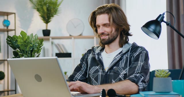 Happy Guy On Computer Stock Footage: Royalty-Free Video Clips - Storyblocks