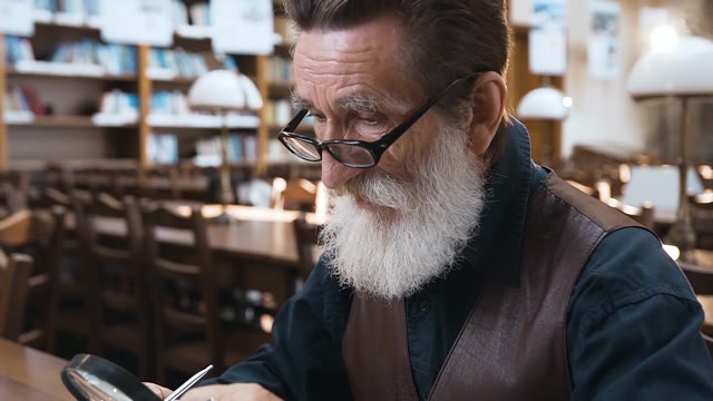 Old Man Studying Stock Footage: Royalty-Free Video Clips - Storyblocks