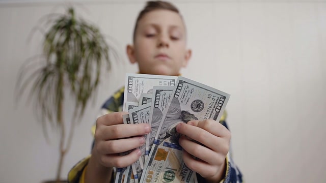 Money Boy Stock Footage: Royalty-Free Video Clips - Storyblocks