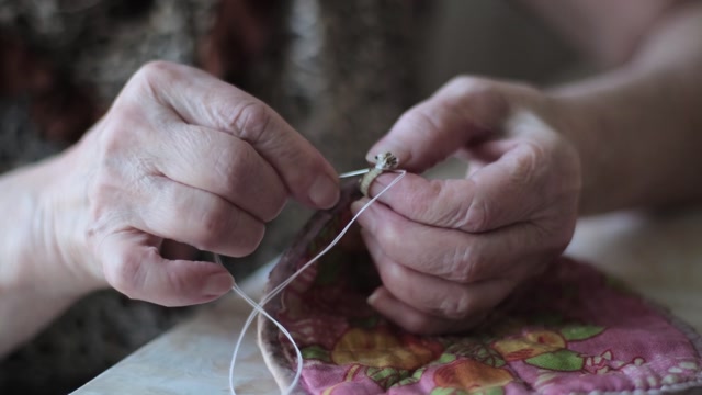 Stitching Hand Stock Footage: Royalty-Free Video Clips - Storyblocks