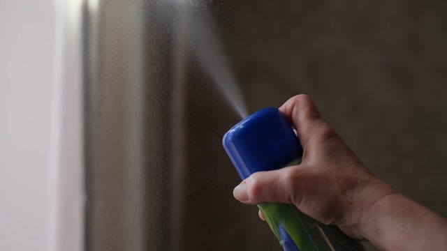 Woman Spraying Stock Footage: Royalty-Free Video Clips - Storyblocks