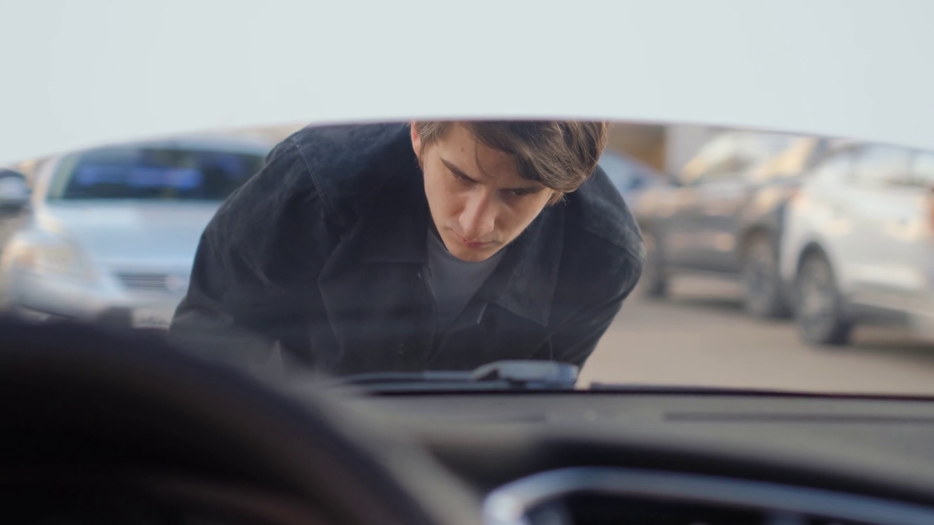 A Confused Young Driver Looks Under Hood Of Stock Footage SBV-351901436 ...