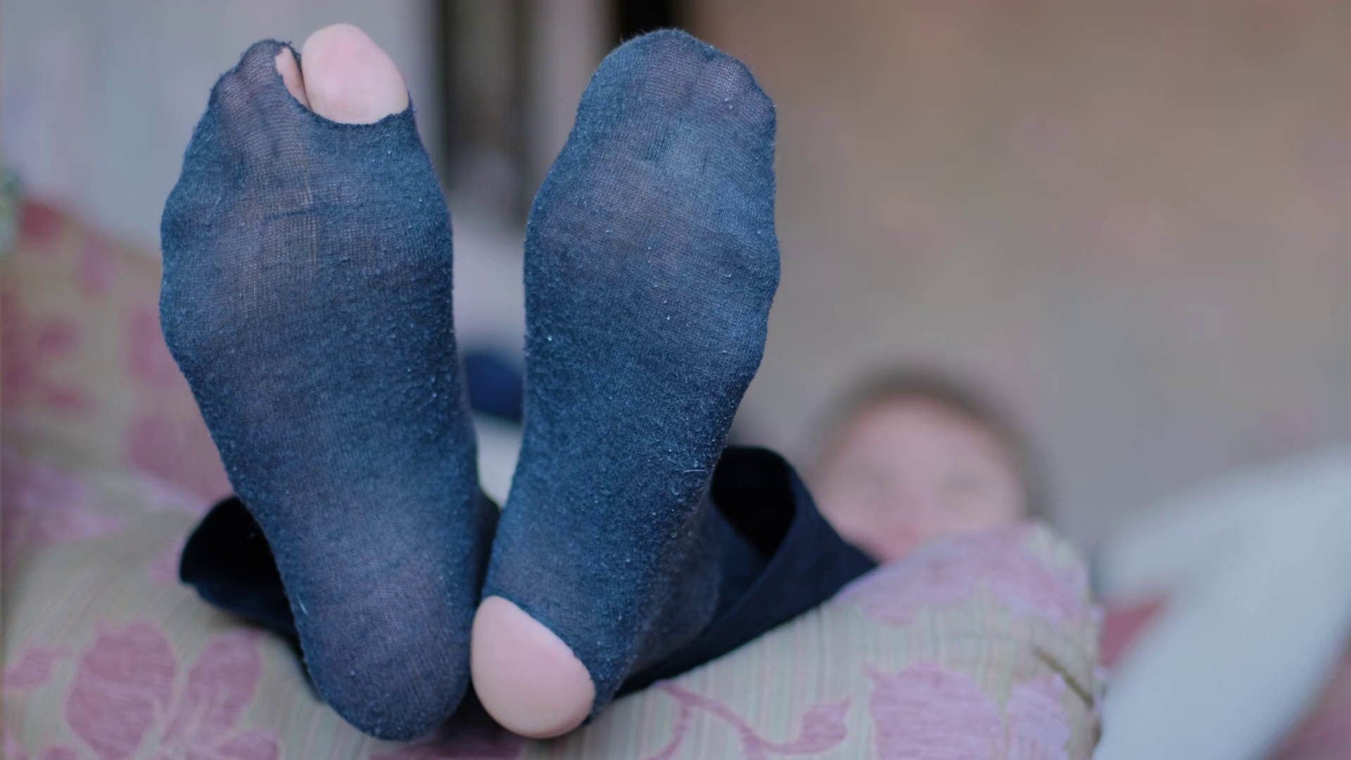 A Man Lying On Sofa In Holey Socks Stock Footage SBV-338977825 ...