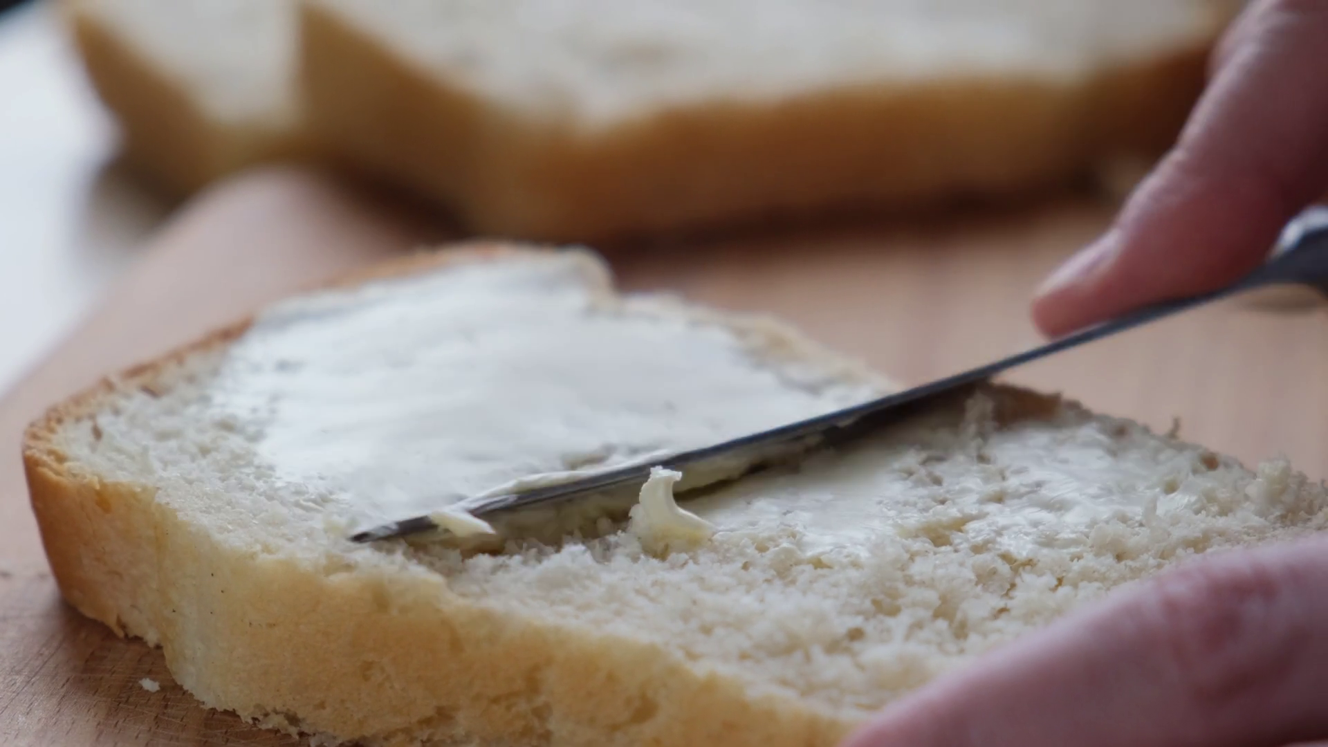 Hand Smears Vegan Butter On Yeast-free Bread Stock Footage SBV ...