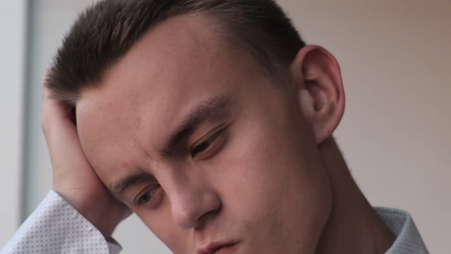 Puzzled Facial Expression Stock Footage: Royalty-Free Video Clips ...