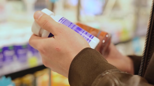 People Scanning Bottles Stock Footage: Royalty-Free Video Clips ...