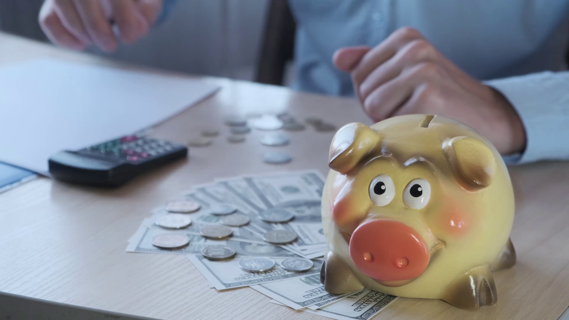 A Businessman Throws Coin Into Piggy Bank Stock Footage SBV-337838996 ...