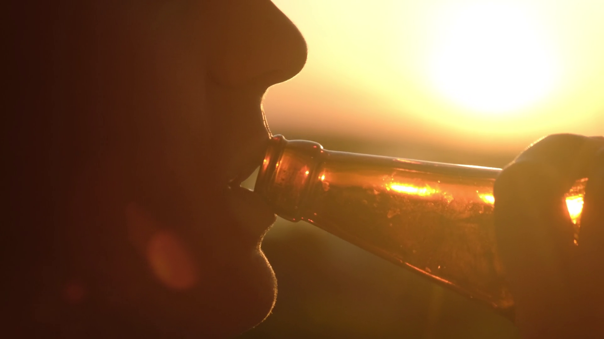 A Man Drinking Beer At Sunset Close-up Stock Footage SBV-338531637 ...