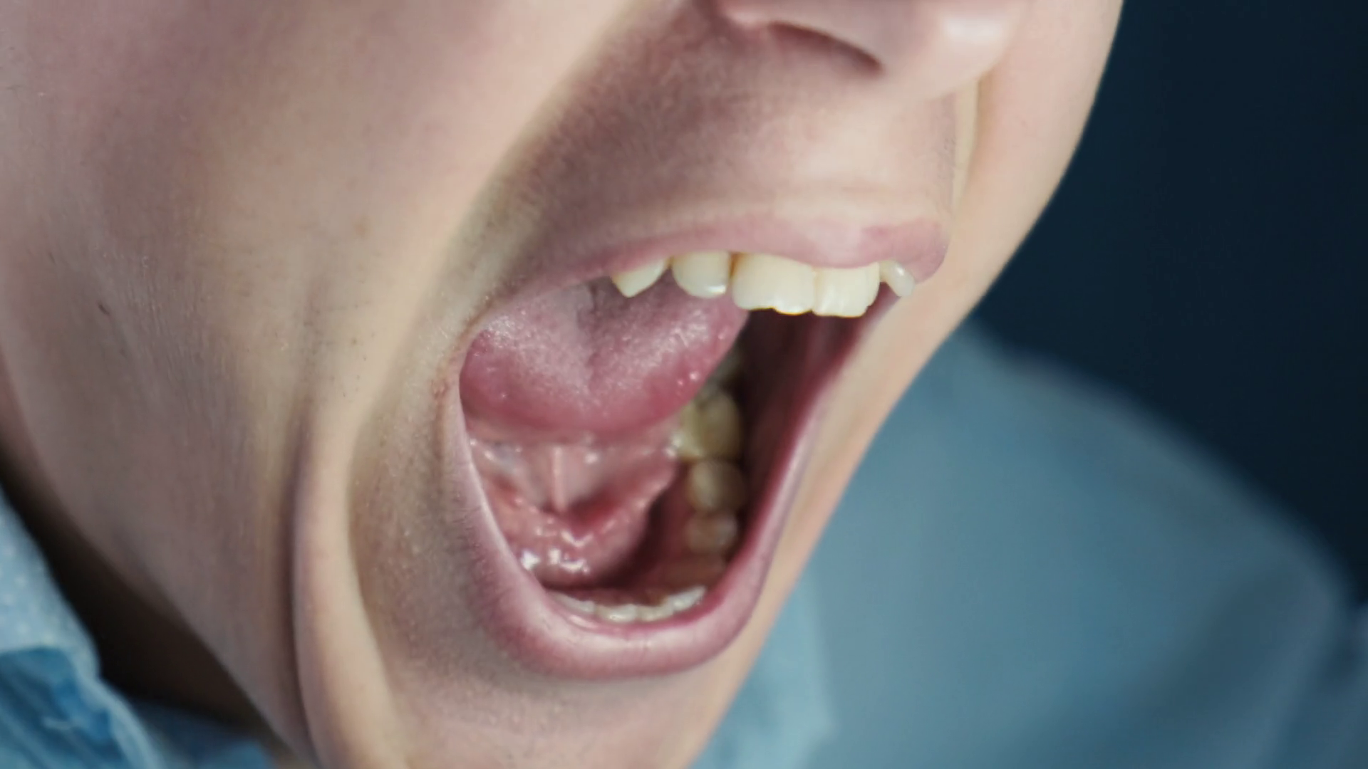 Angry young man screaming opening his mouth, close-up Stock Video ...