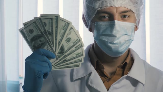 Medicine With Money Stock Footage: Royalty-Free Video Clips - Storyblocks
