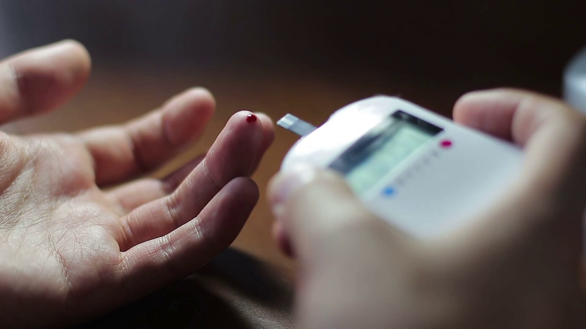 Diabetic Man Measures Blood Sugar Level At Stock Footage SBV-337682521 ...