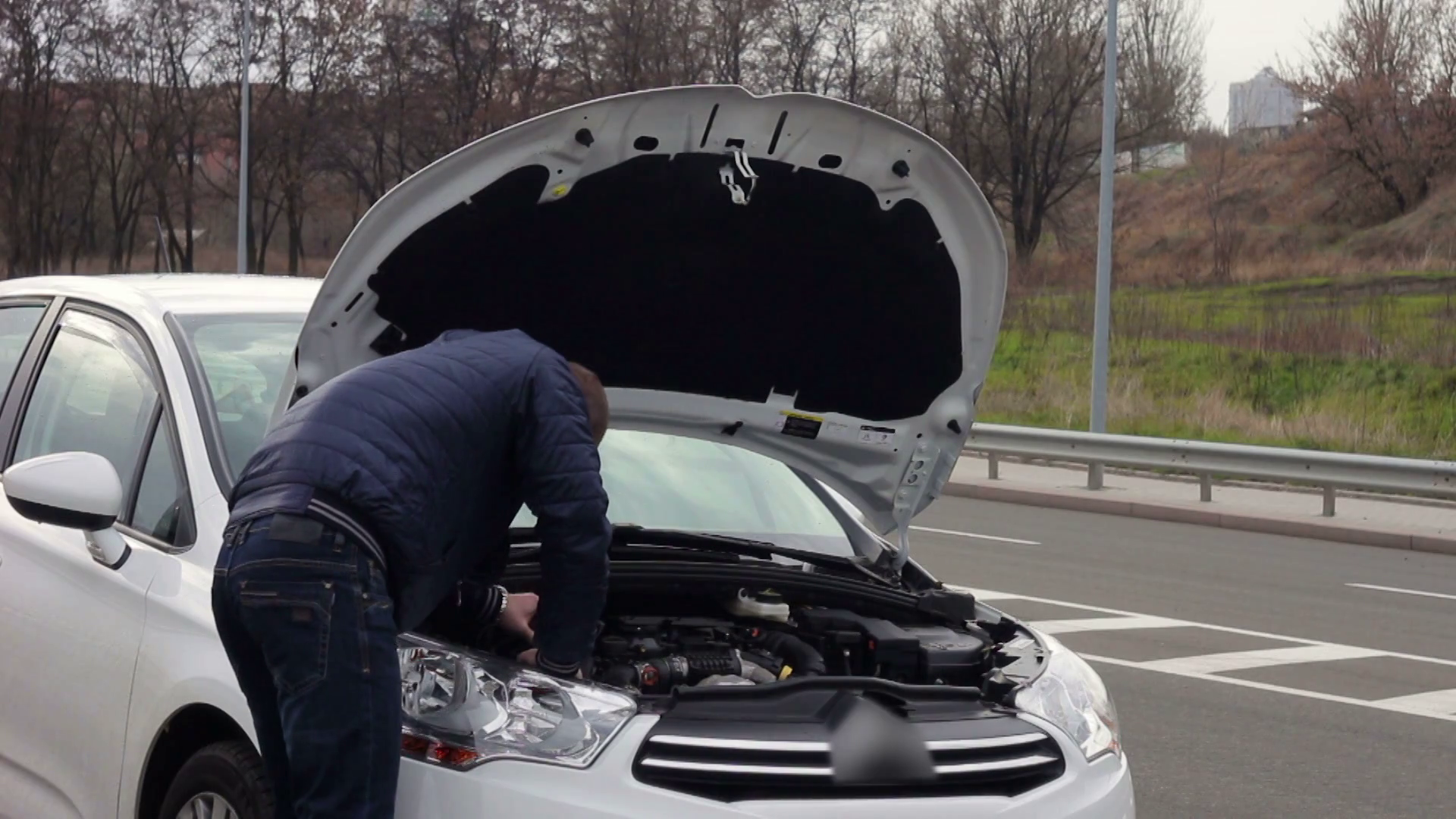 Stranded Person Inspects Car Engine Stock Footage SBV-314671151 ...
