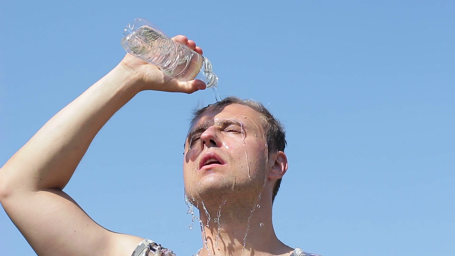 The guy pours water on his head trying to cool. Summer Heat Stock Video ...
