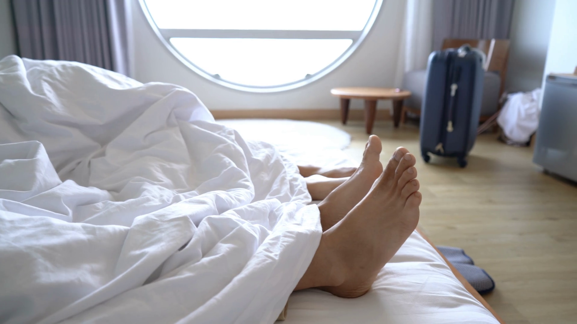 Feet Of Couple Under Blanket On Bed Resting Stock Footage SBV-347523183 ...