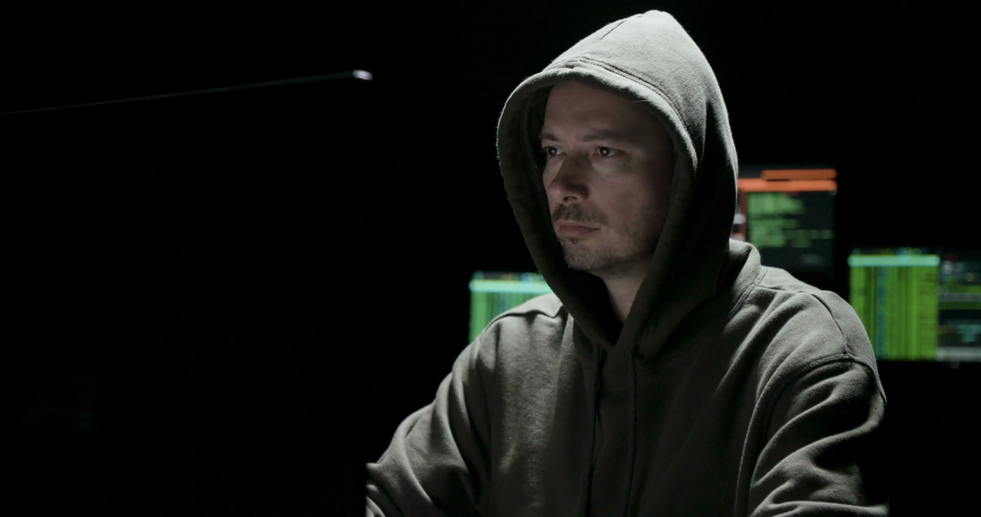 Male Hacker Sitting Behind Computer Stock Footage SBV-332606716 ...