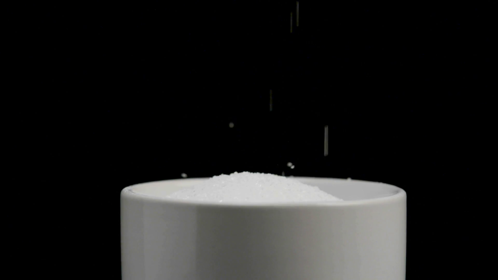 Sugar Falling Down Into White Bowl Stock Footage SBV-330130879 ...