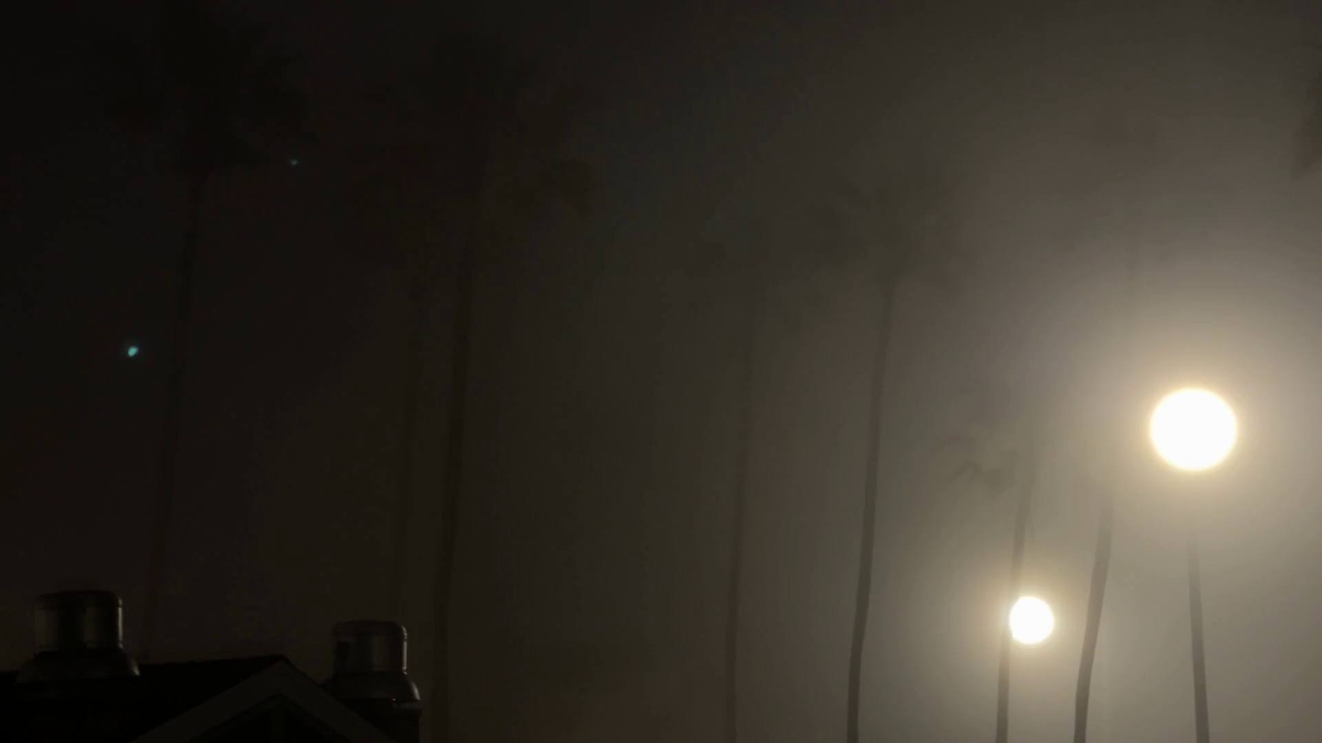Lights Pierce Through Thick Fog During Night Stock Footage SBV ...