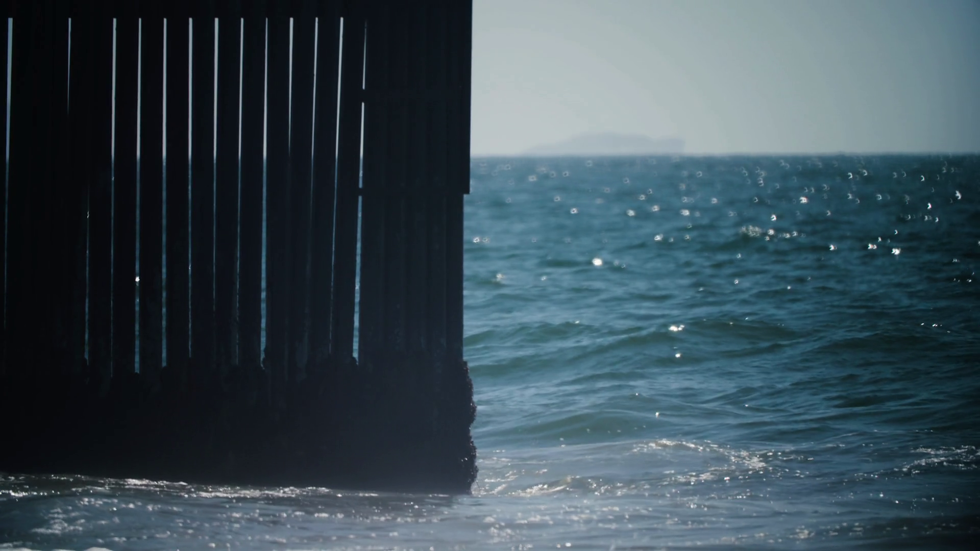 Edge Of Mexico Border Wall Runs Into Pacific Stock Footage SBV ...