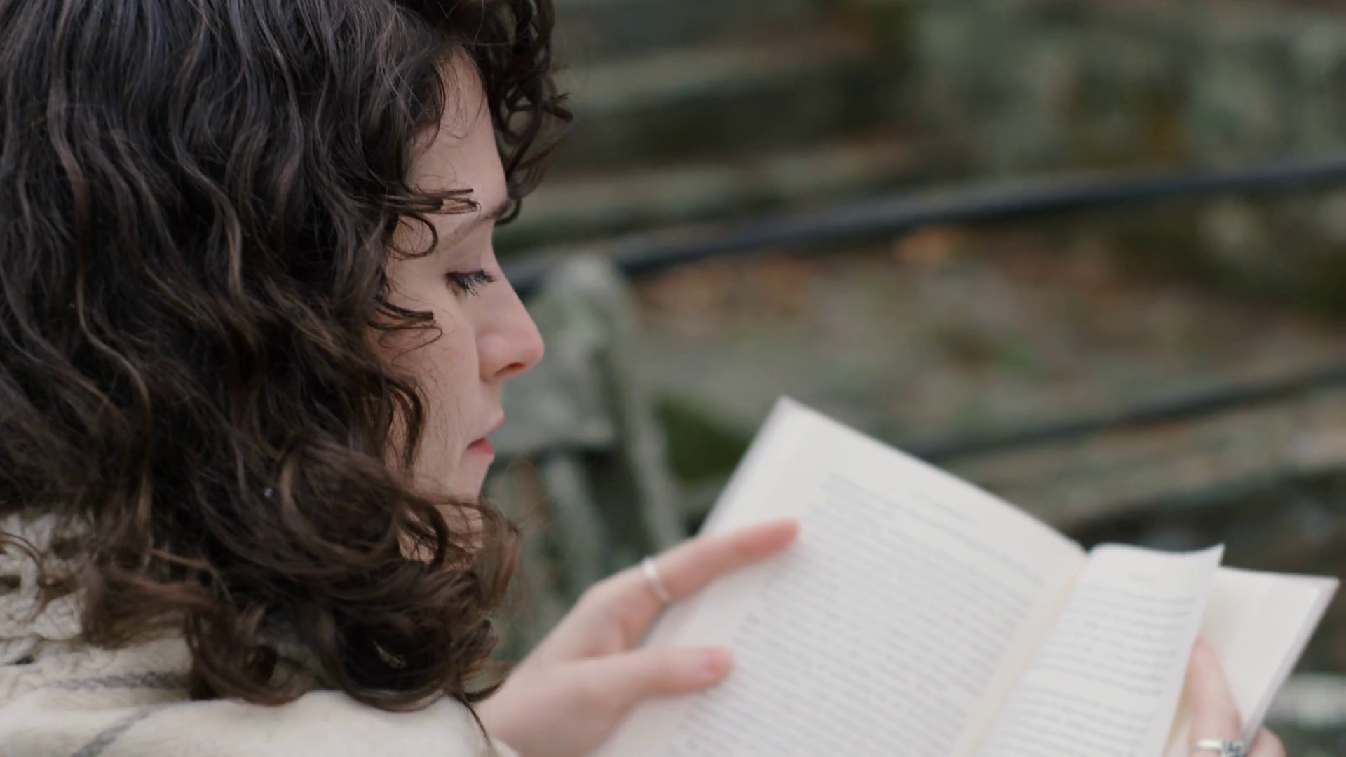 Pretty Woman Reading Book In Park Looks Over Stock Footage SBV ...