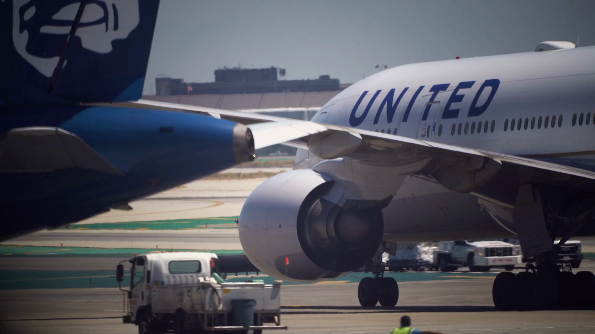 Small Vehicles Surround United Airlines On Stock Footage SBV-337831933 ...