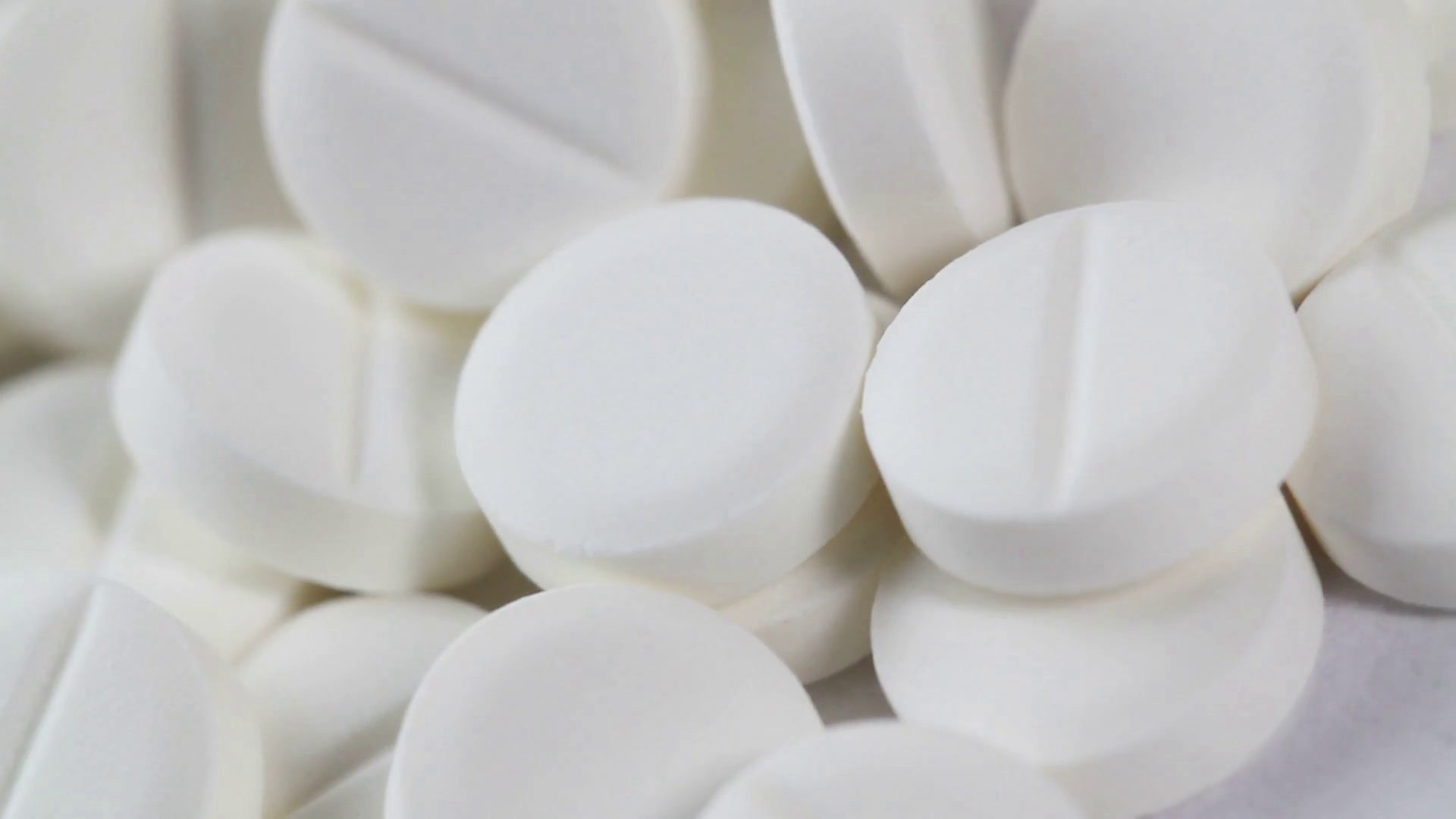 white pills rotate on white background. closeup Stock Video Footage 00: ...
