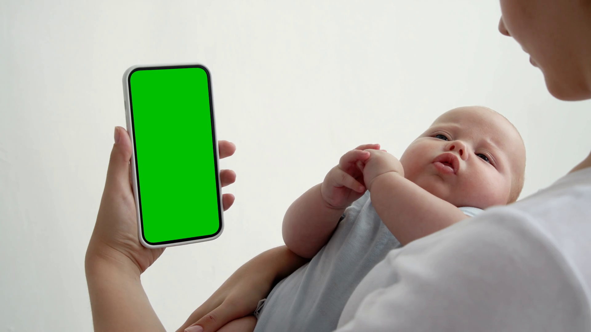 Young Mum With Baby Use Smartphone With Stock Footage SBV-348832125 ...