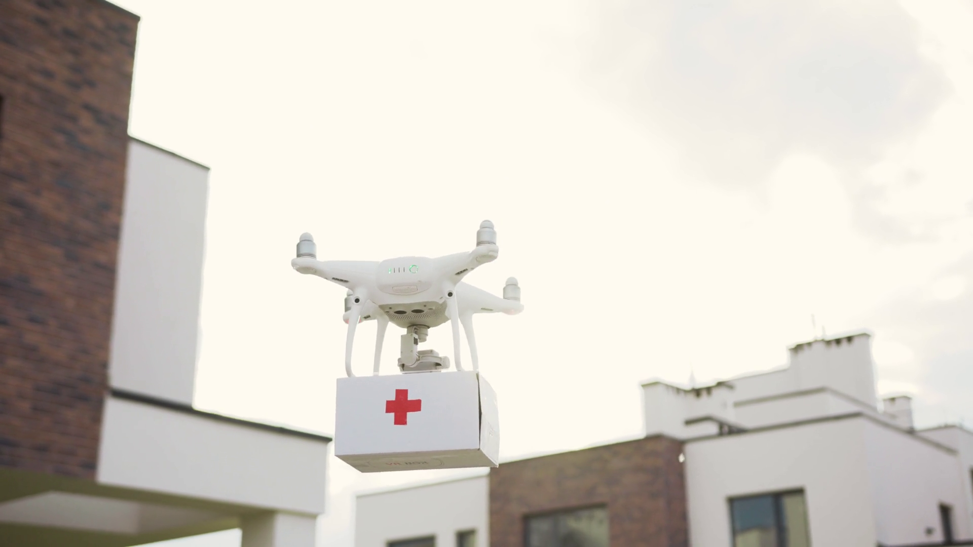 A Drone Swiftly Delivers Red Cross Box Stock Footage SBV-351936745 ...