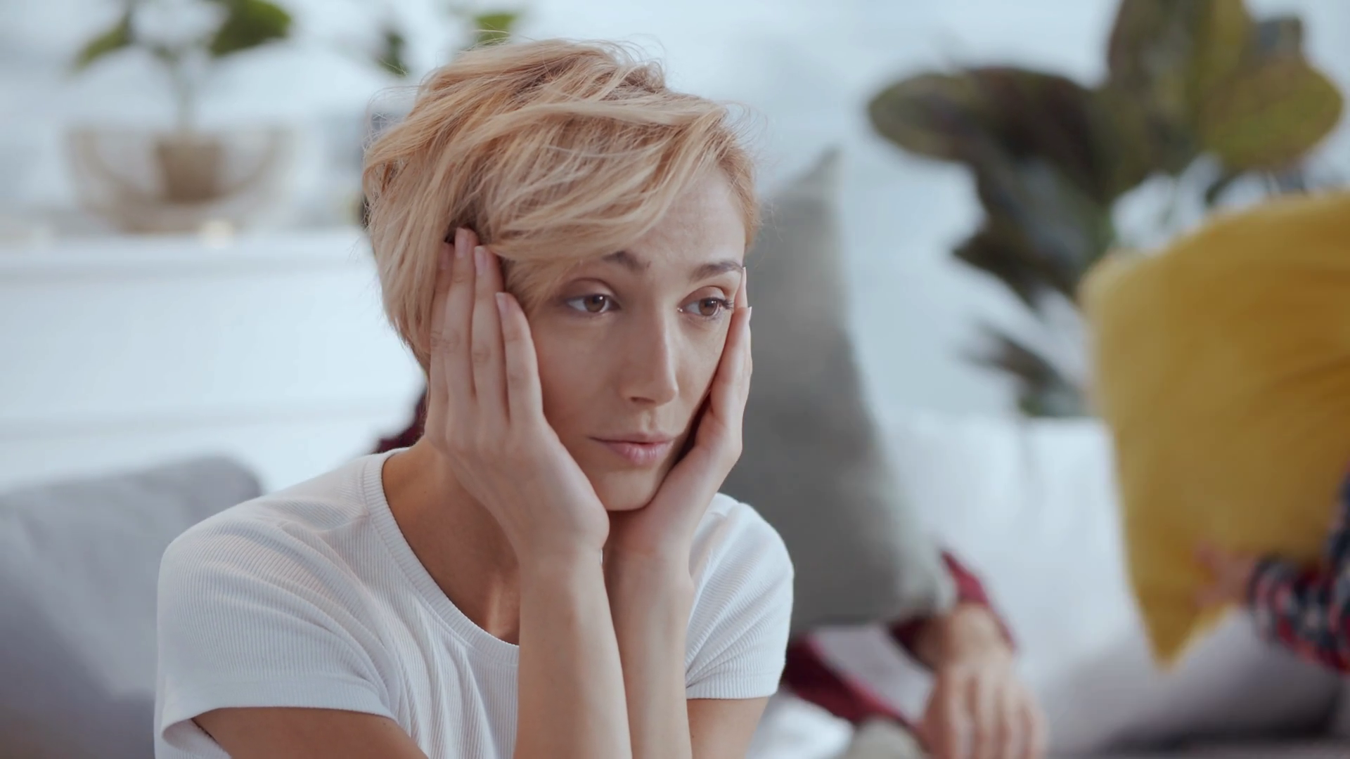 A Woman Shows Distress On Couch Reflecting Stock Footage SBV-351945357 - Storyblocks