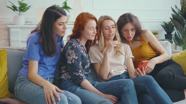 Women Watching Video Stock Footage: Royalty-Free Video Clips - Storyblocks