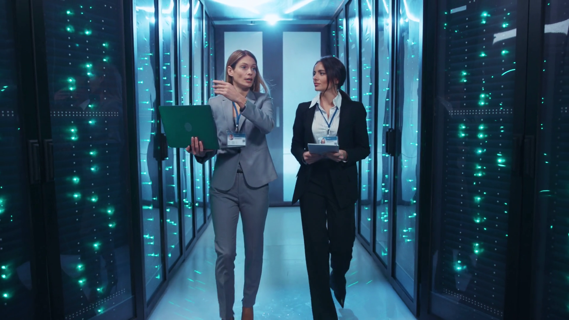 Two Women Discuss Technology In Data Center Stock Footage SBV-351945617 ...