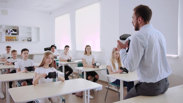 Teacher Instructing Class Stock Footage: Royalty-Free Video Clips ...