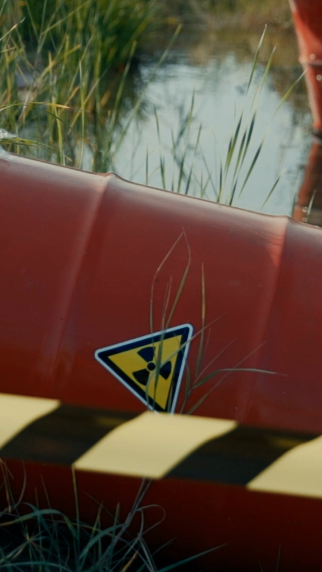 A Hazardous Waste Barrel Located Near Water Stock Footage SBV-353102879 ...
