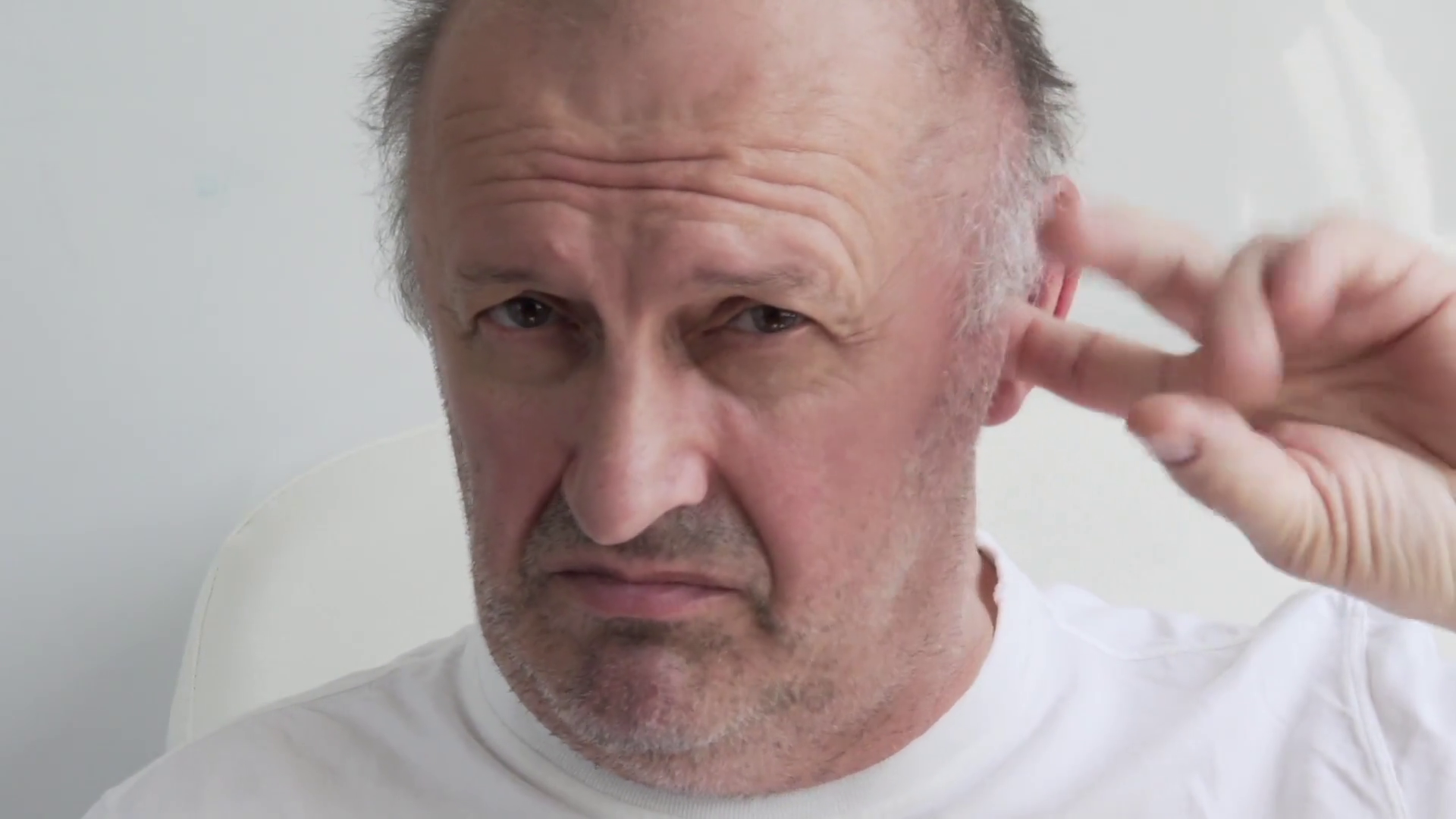 elderly man scratching his ear Stock Video Footage 00:21 SBV-346874898 ...