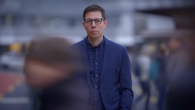 Person In Foreground Stock Footage: Royalty-Free Video Clips - Storyblocks