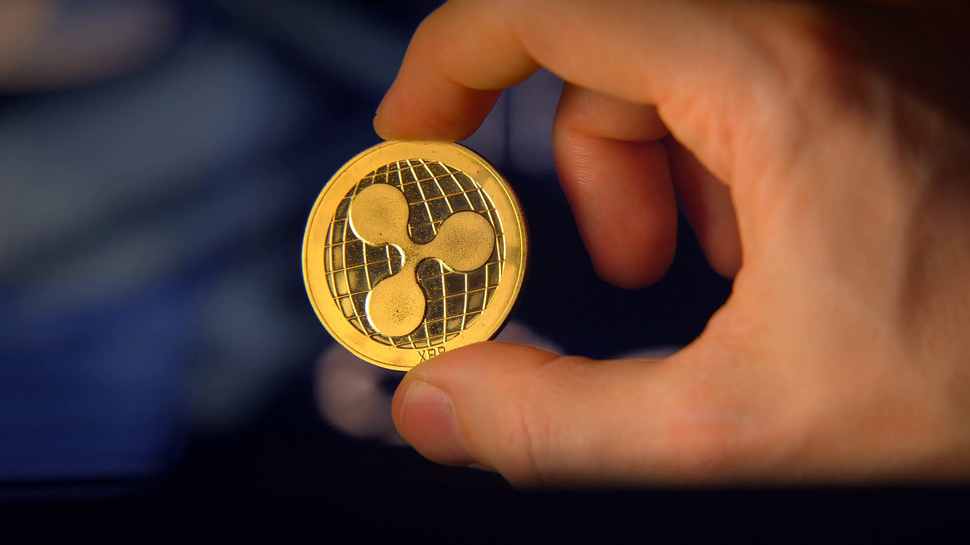 A Human Hand Grasping Shiny Gold Coin Stock Footage SBV-351691466 ...