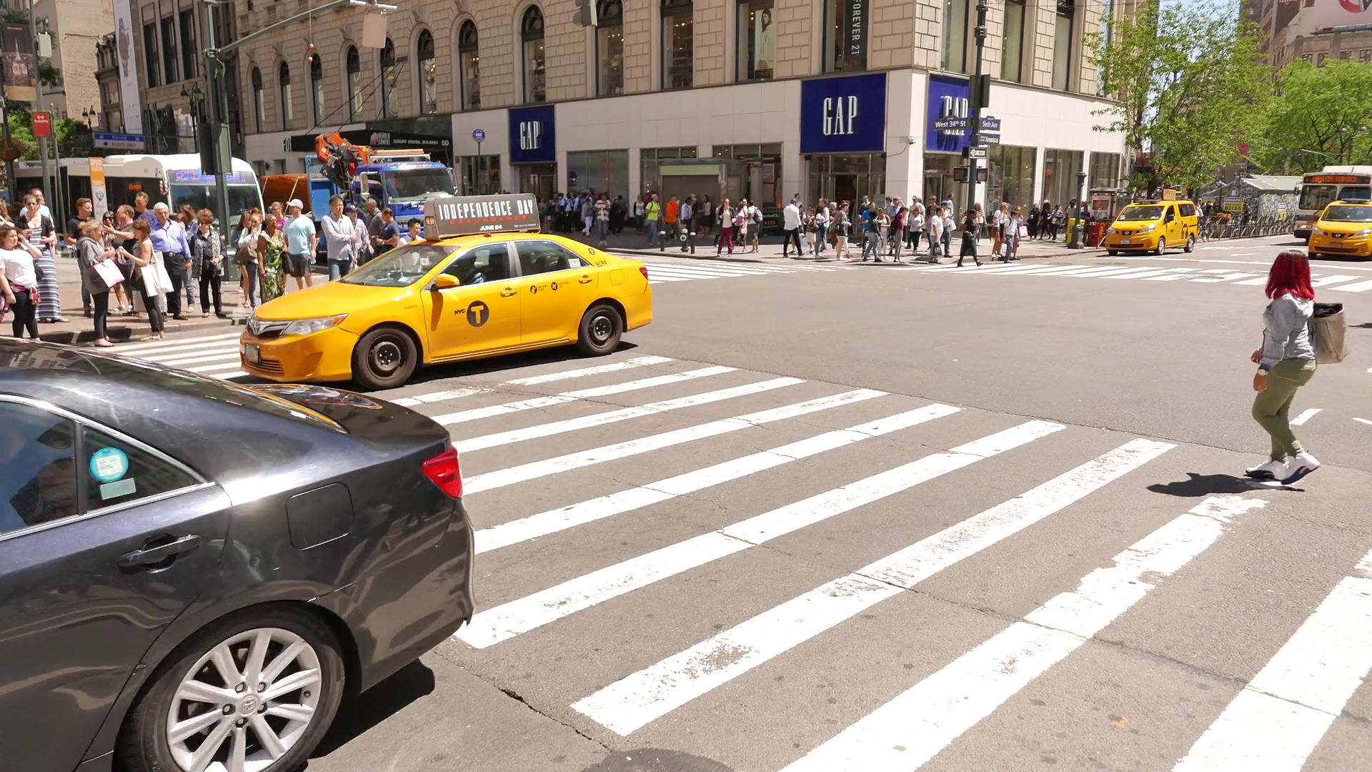 crowd of people crossing city street. commuters going to workplace ...