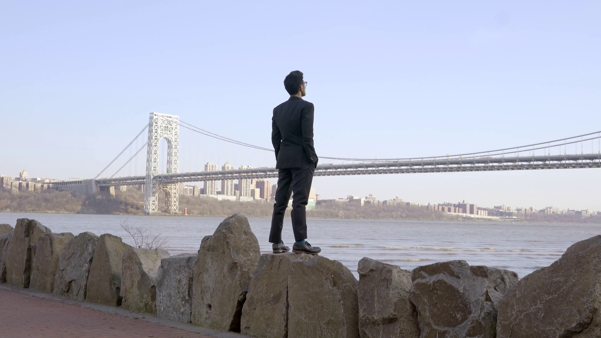 Successful Man Standing On Rock Raising Arms Stock Footage SBV ...