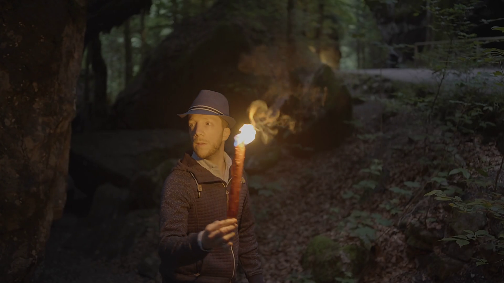 Young Man Exploring Cave In Forest With Stock Footage SBV-348484782 ...