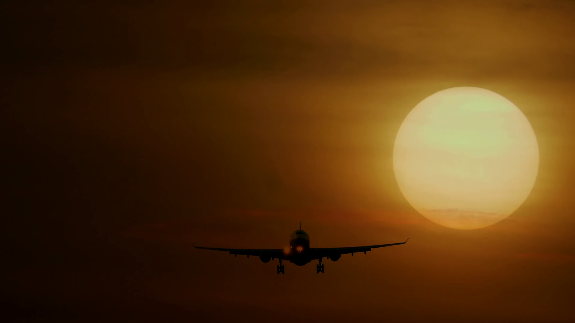 Airplane Flying in front of Large Sun at Sunset Sky Stock Video Footage ...