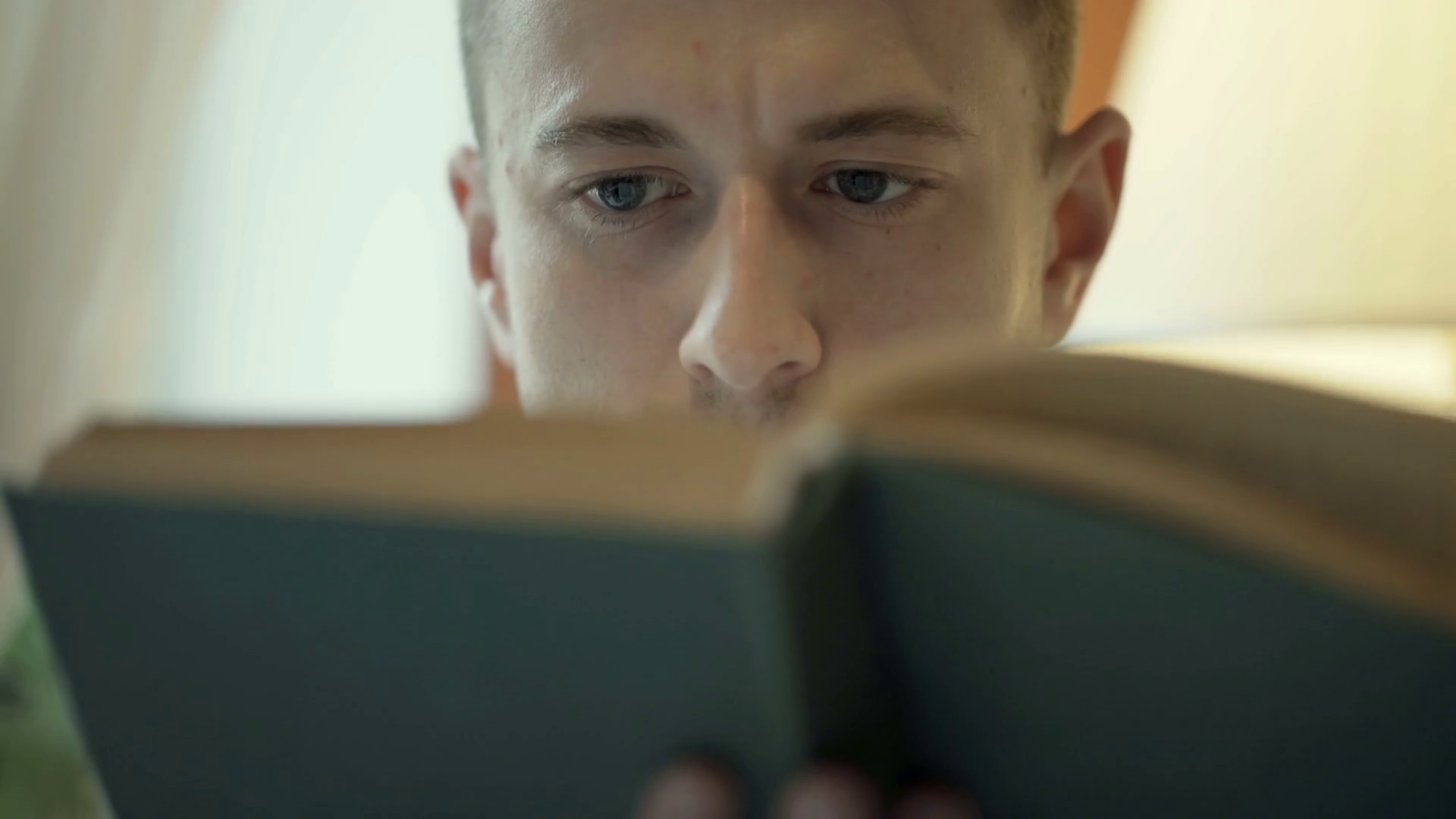 Absorbed Man Reading Interesting Book In Stock Footage SBV-311466496 ...