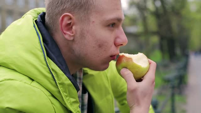 Man Eating Fruits Stock Footage: Royalty-Free Video Clips - Storyblocks