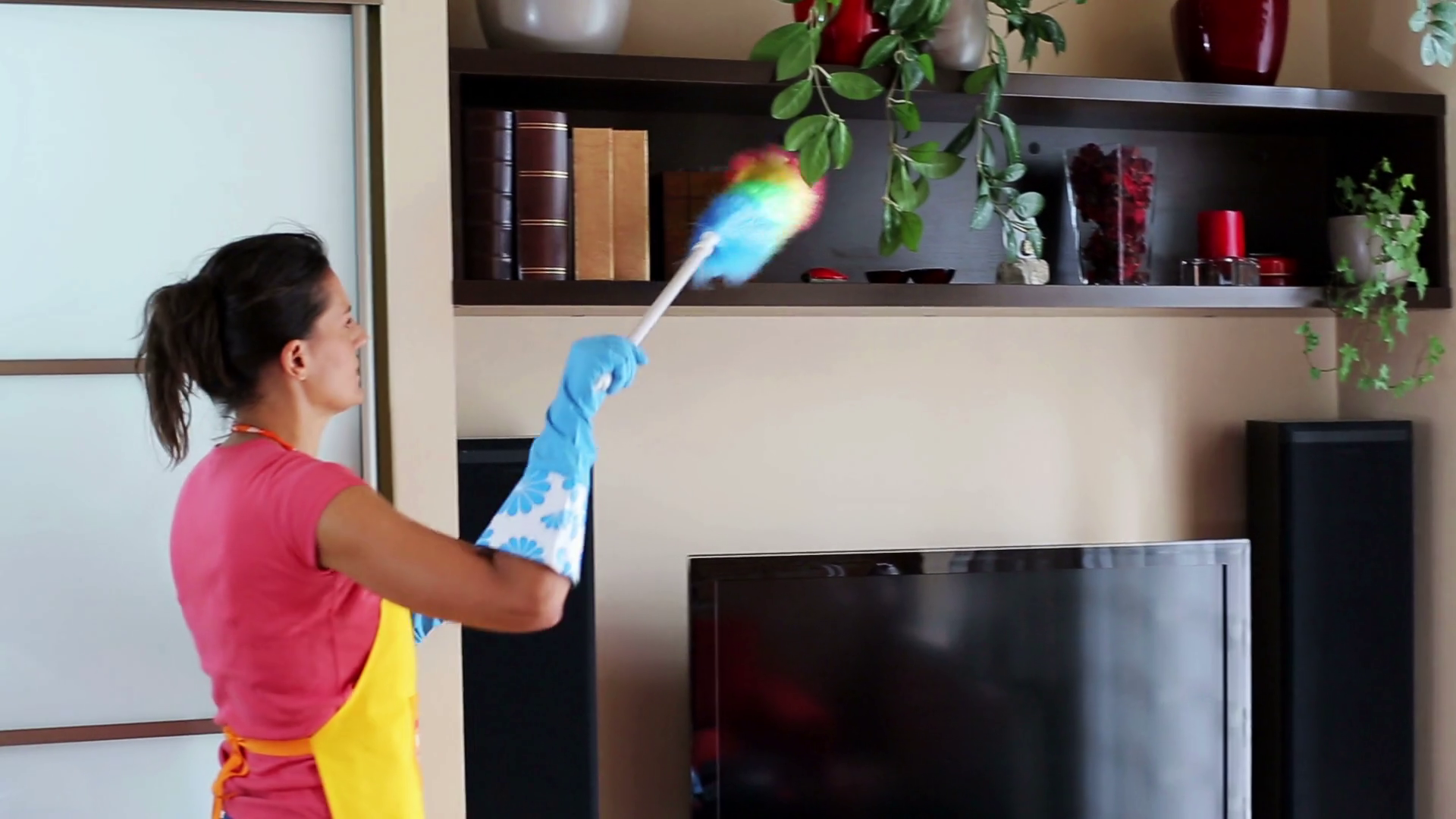 Woman Dusting Bookcase Stock Footage SBV-301328612 - Storyblocks