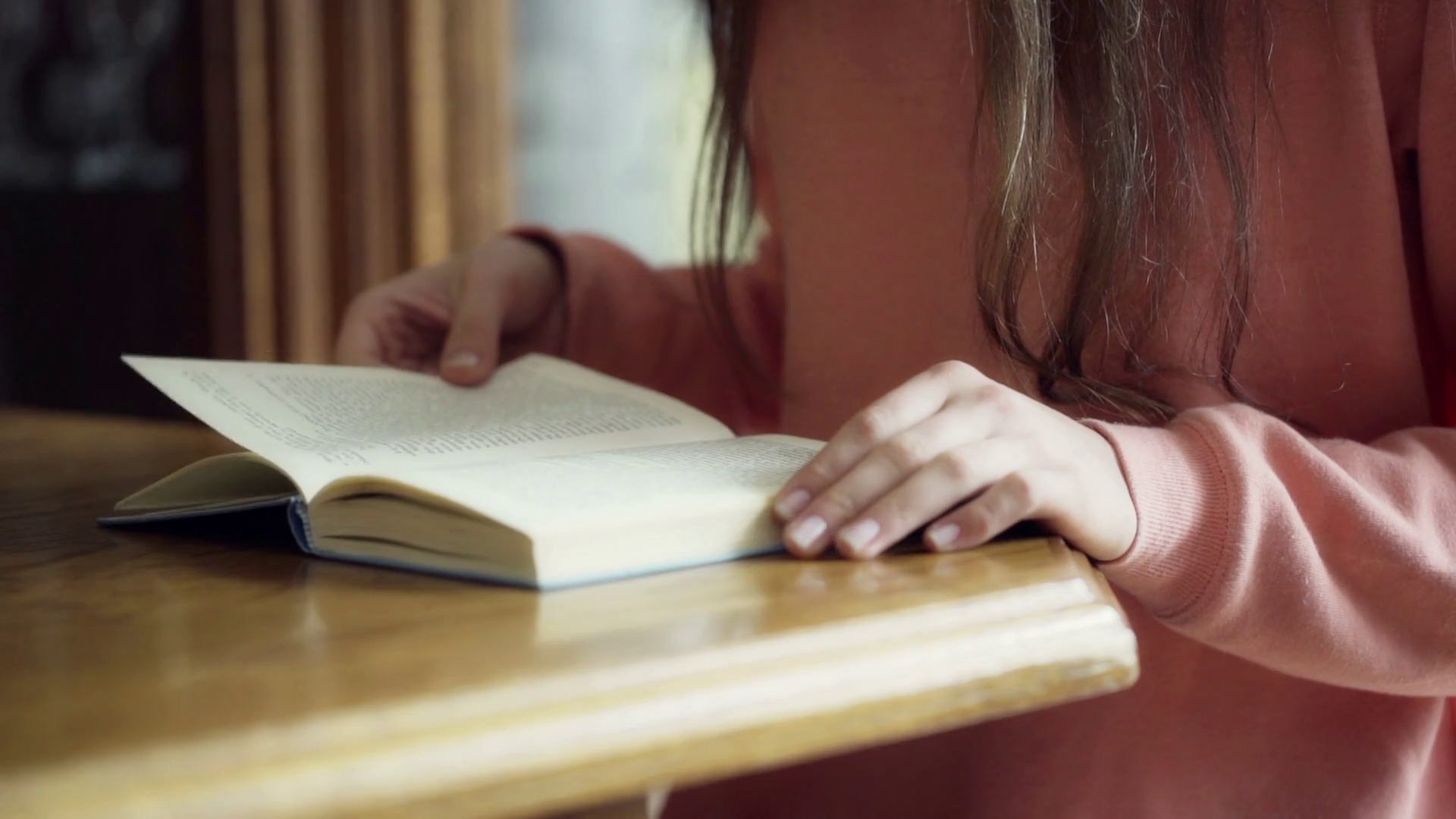 Woman Sitting At Table Reading Book Closeup Stock Footage SBV-301417839 ...